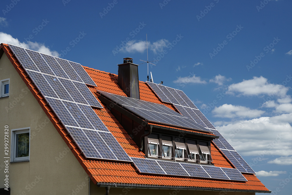 Photovoltaik Anlage auf einem Dach mit Dachgauben Stock Photo | Adobe Stock