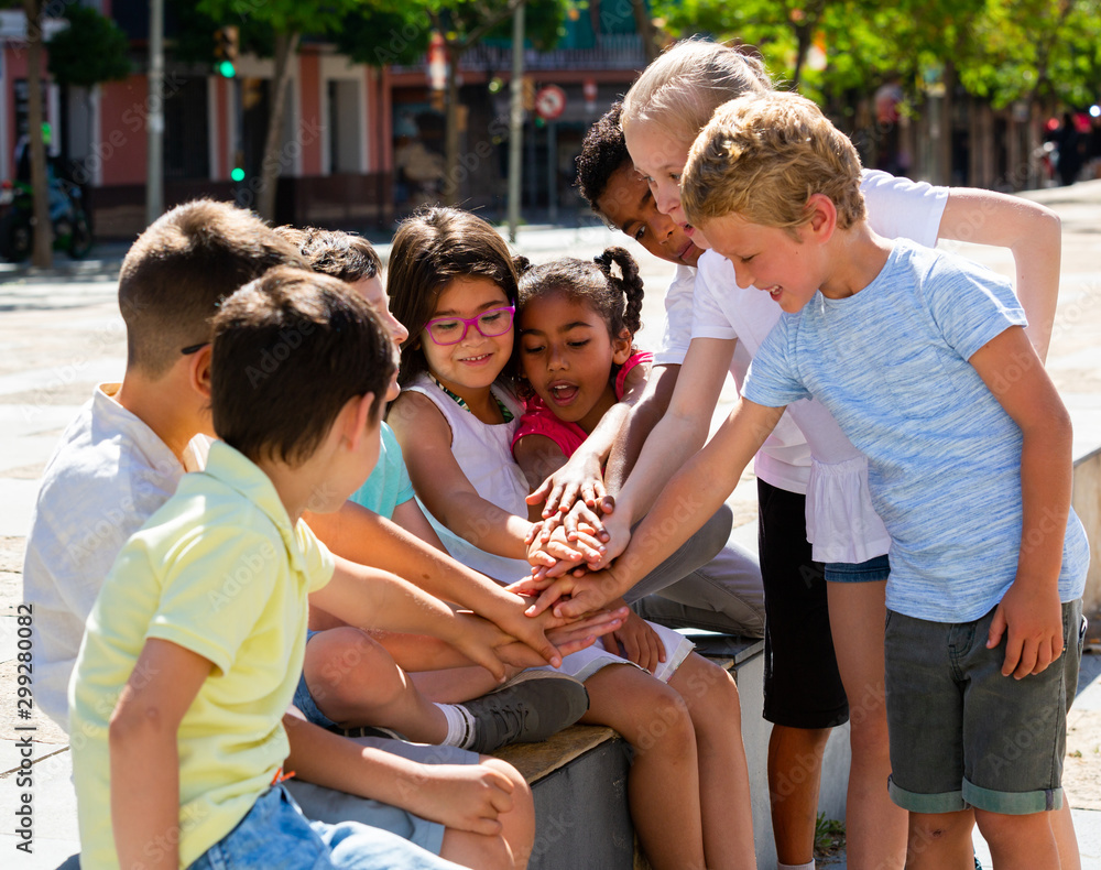 Happy kids playing on summer city street Stock Photo | Adobe Stock