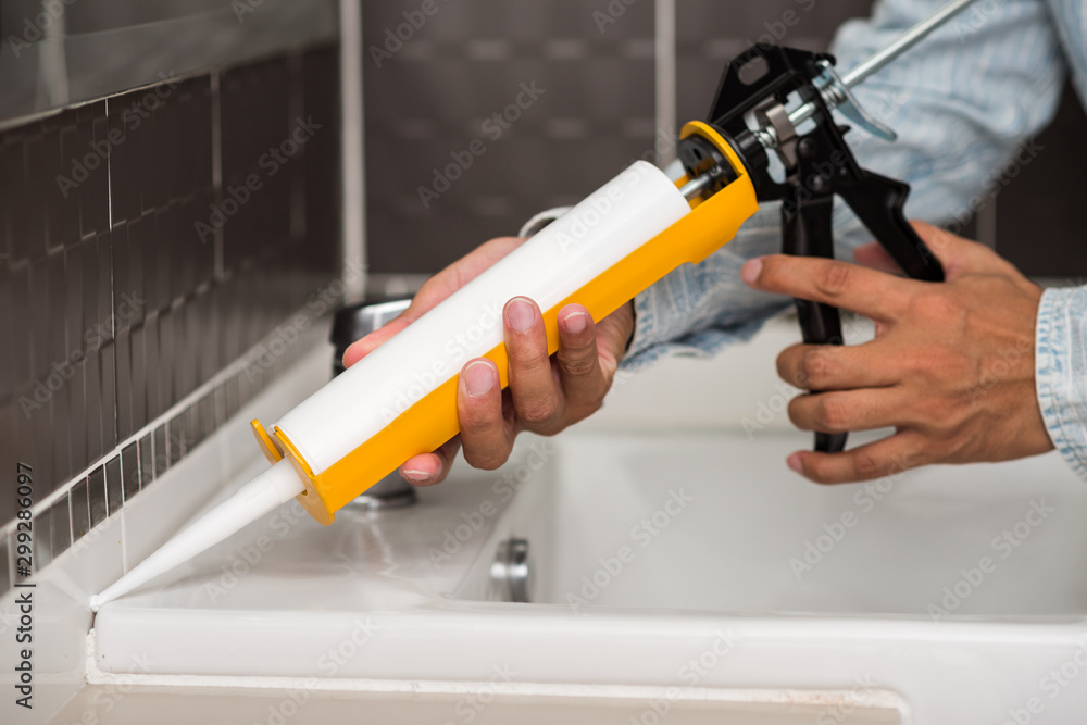apply silicone sealant Stock Photo | Adobe Stock