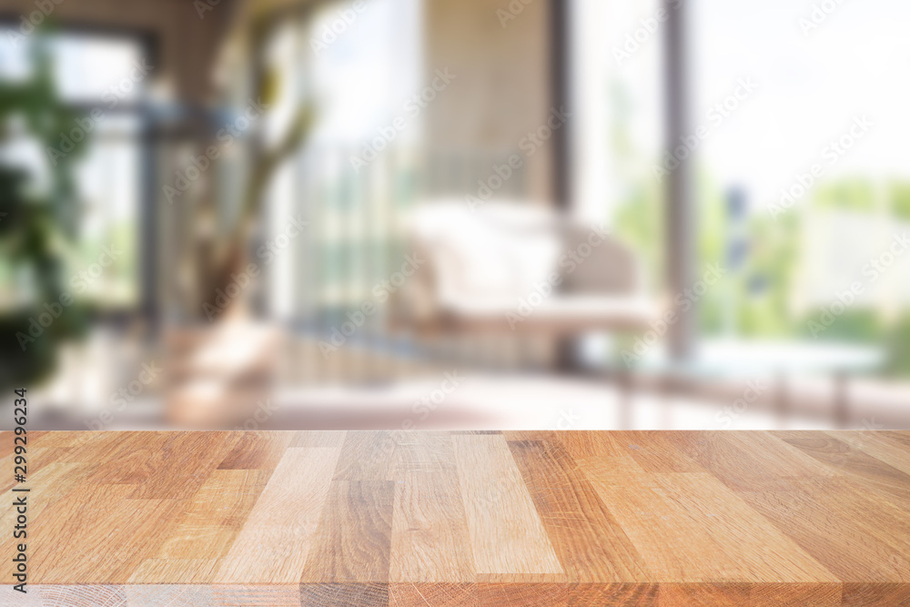 Brown empty wooden table and interior living room background, product display, blurred light ...