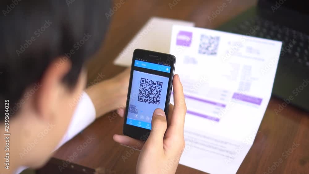 Stockvideo Paying electricity bills, and other utility bills such as ...