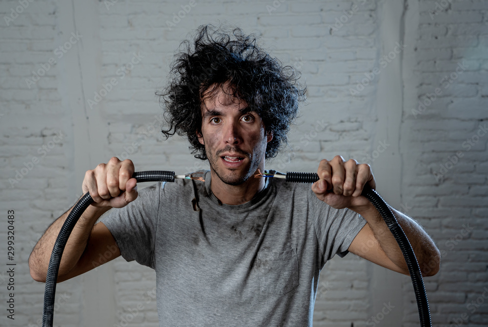 Funny image of man getting electric shock with funny face and smoke all ...