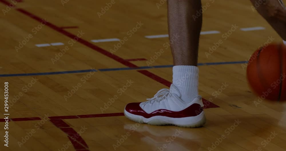 CU on legs, African American black college male basketball player ...