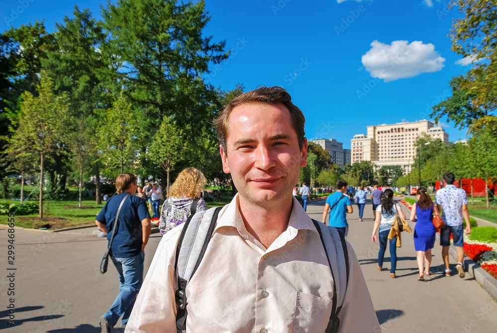 Man posing on Manezhnaya (Manege Square) is pedestrian open space in ...