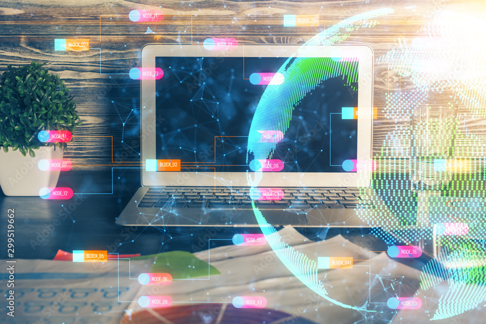 Multi exposure of table with computer and world map hologram ...