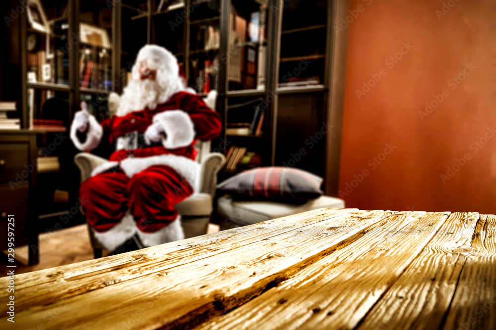 Saint Nicholas is sitting in an armchair. Interior of a luxury home ...