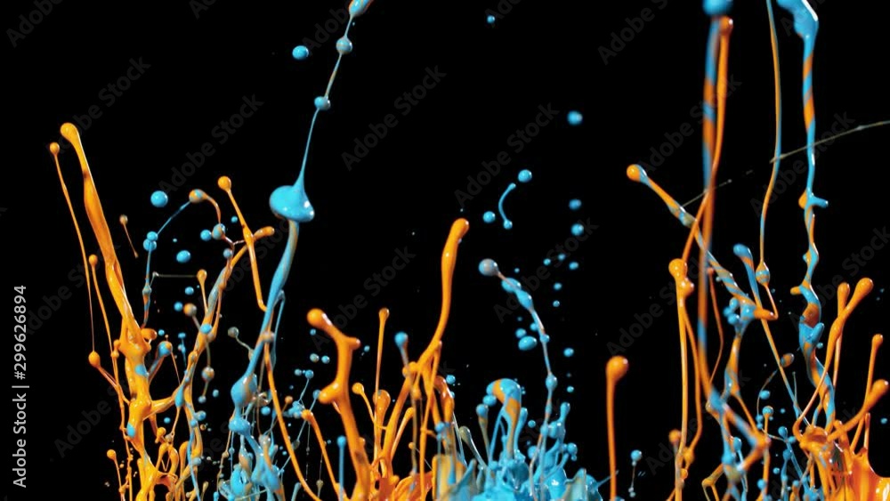 Super slow motion of dancing colours shapes isolated on black ...