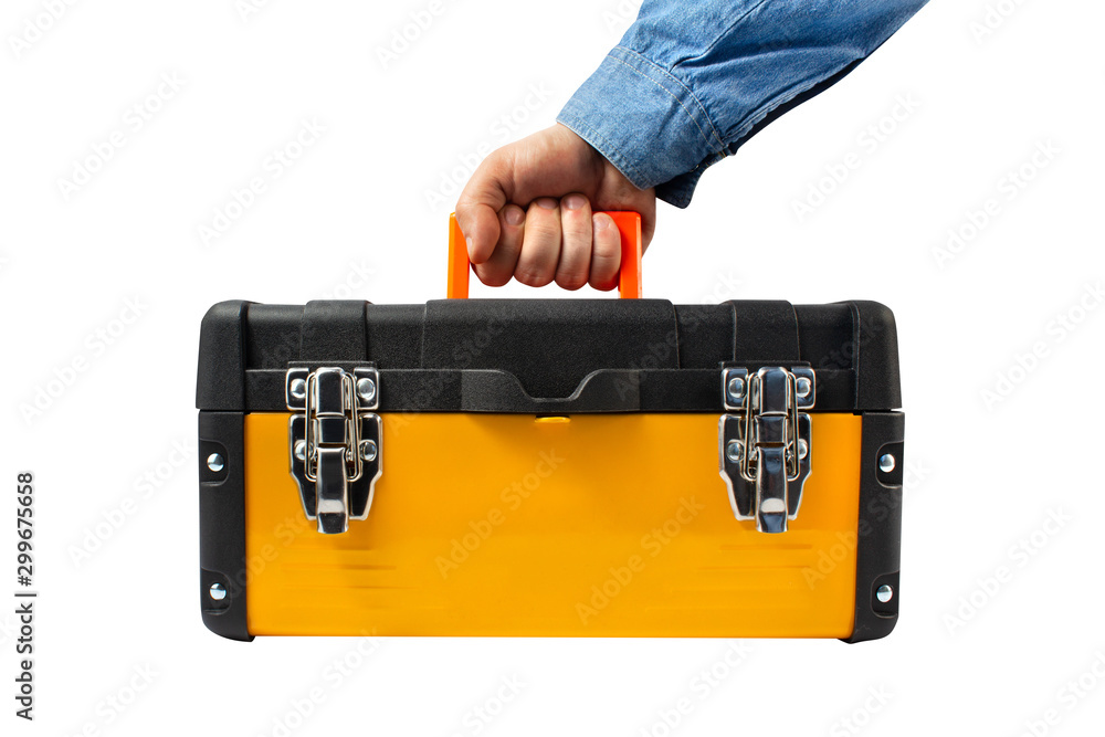 Isolated worker hand holding yellow toolbox. Stock Photo | Adobe Stock