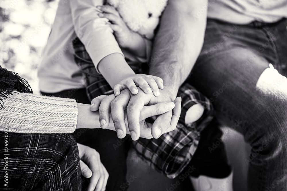 Child hand closeup into parents. Hands of father, mother, keep hand ...