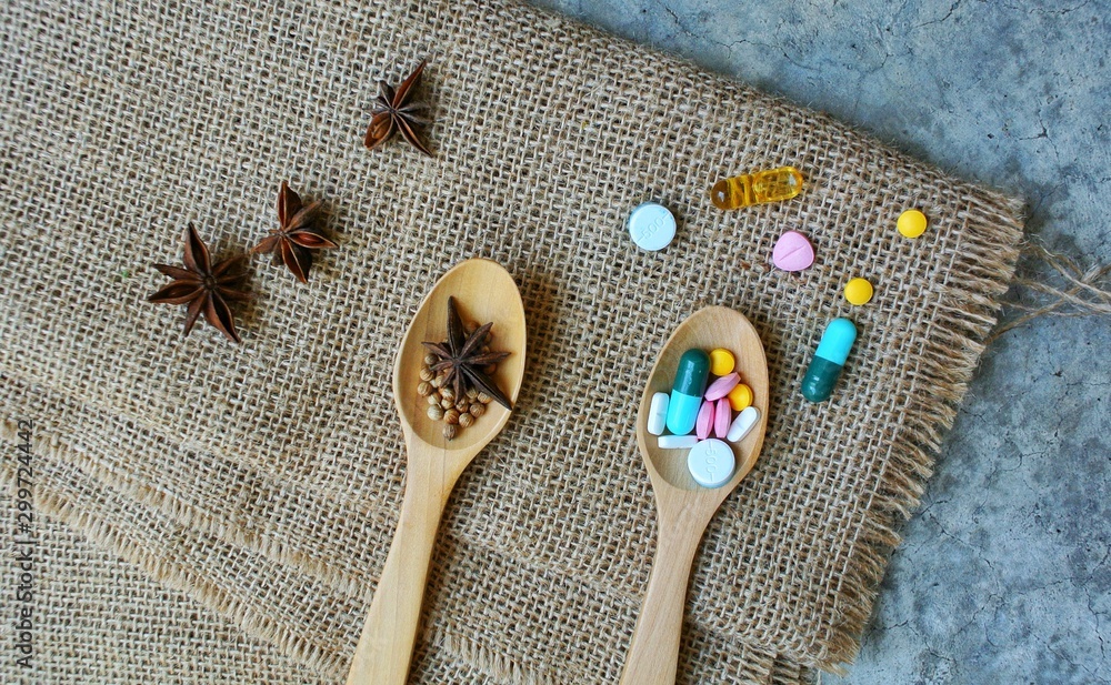 Tablets on a sackcloth background.Paracetamol, Antibiotics ...