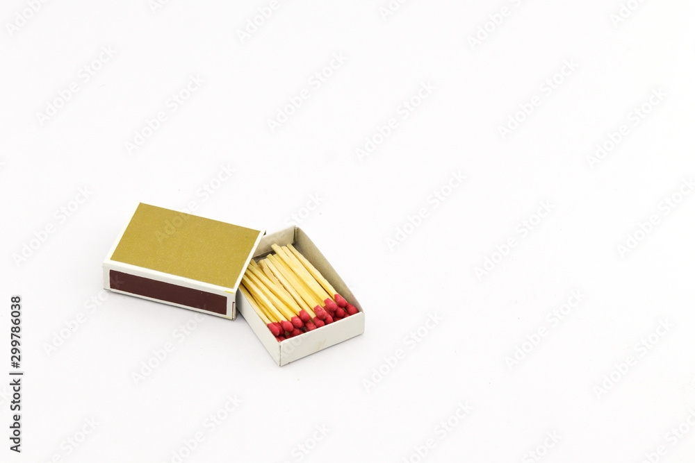 matchbox that half open and see matches sticks inside on white ...