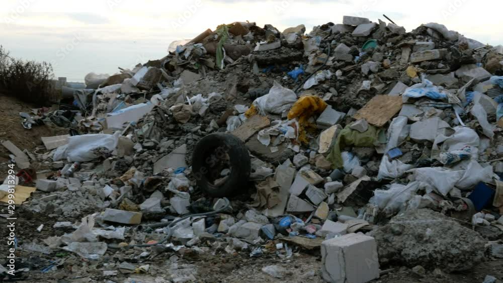 Industrial and household waste. Large garbage pile. Degraded garbage ...