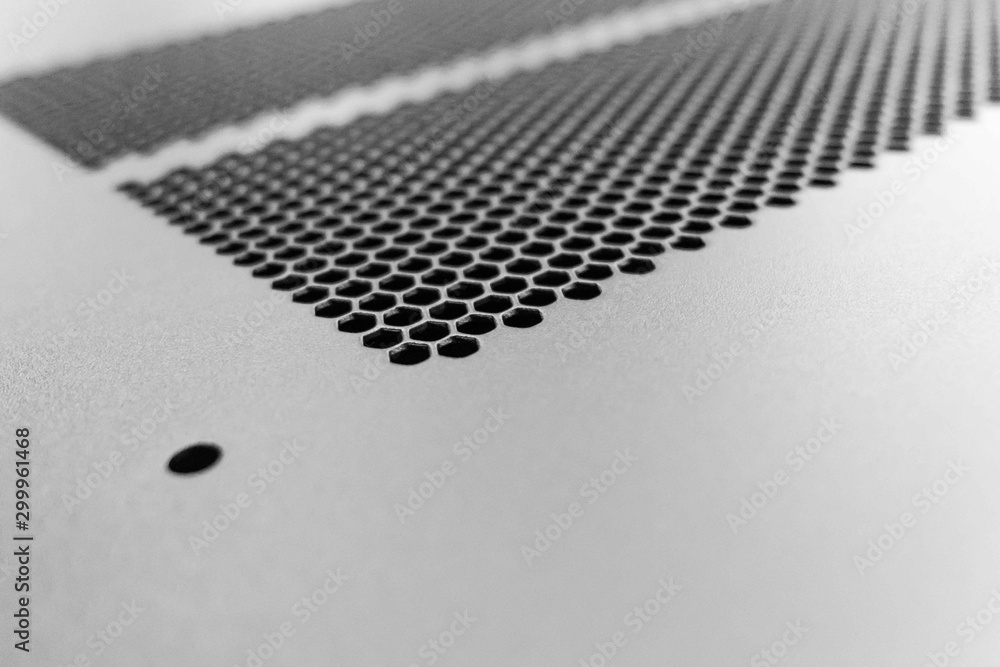 Fotka „Close-up, shallow focus of a meshed style cooling panel used on ...