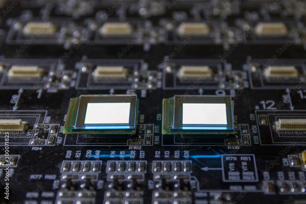 The process of checking several oled displays of white color on the ...