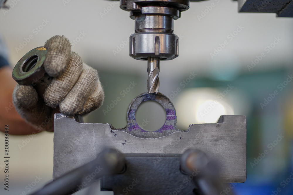 Traditional vertical metal milling machine. In the vertical mill the ...