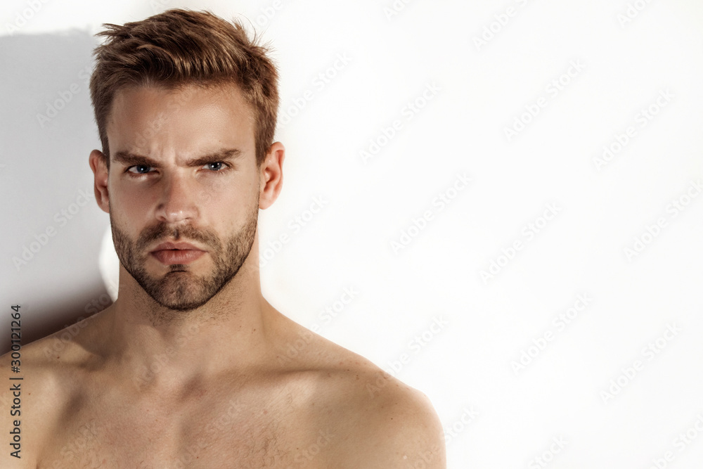 Muscle strong beautiful stripped male model in denim jeans on white ...