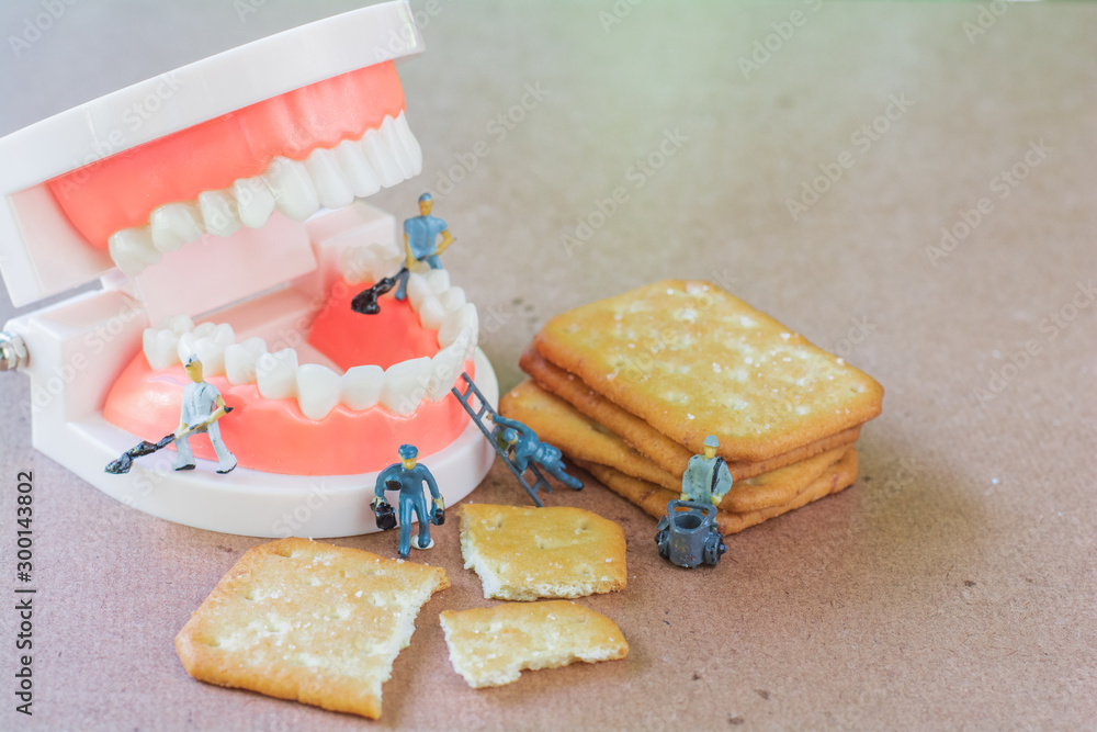 Group of teamwork miniature people, small model human figure cleaning ...