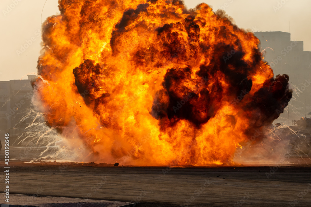 Massive fire explosion or strike in military combat and war. Vehicle ...
