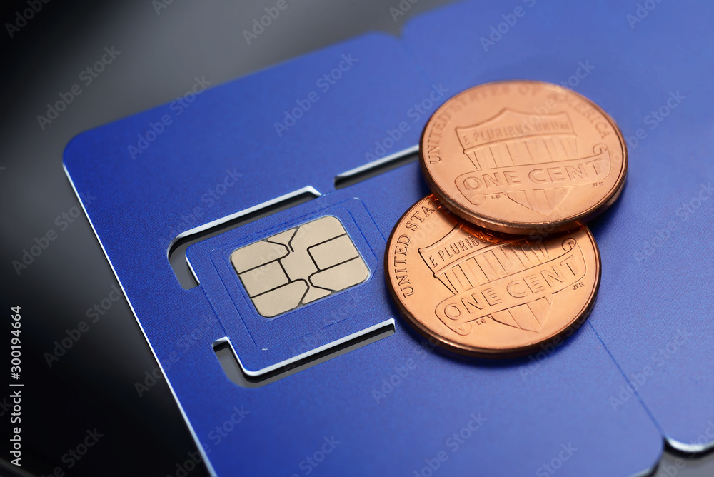 SIM card pre-cuted mini, micro, nano sizes and one cent coins. Stock ...
