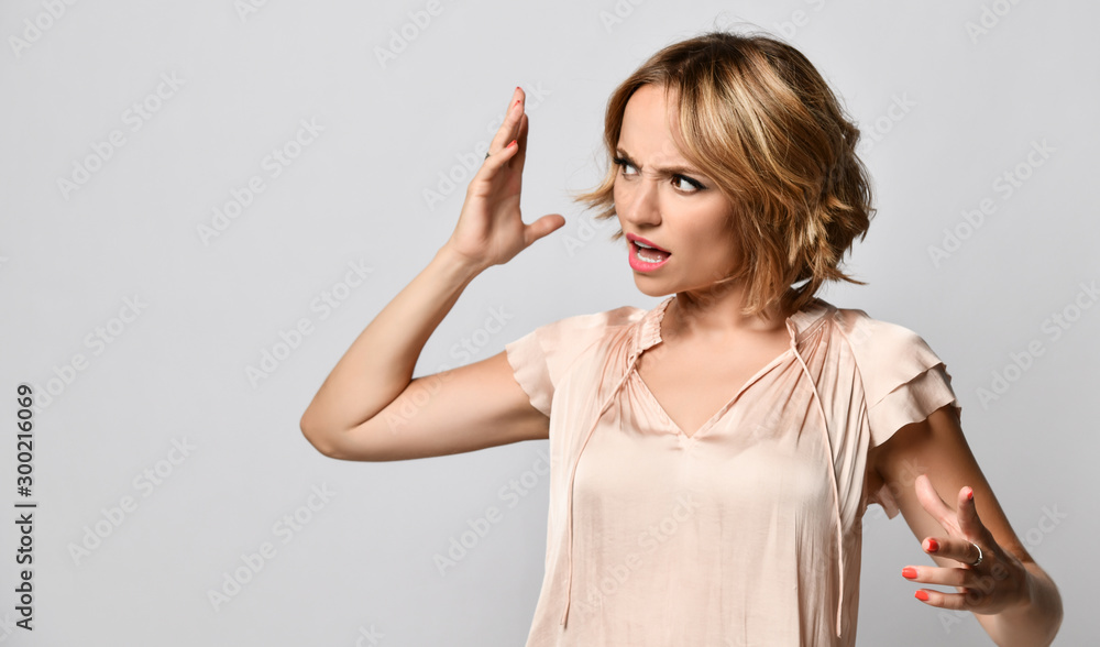 Angry woman raise hand about to slap Stock Photo | Adobe Stock