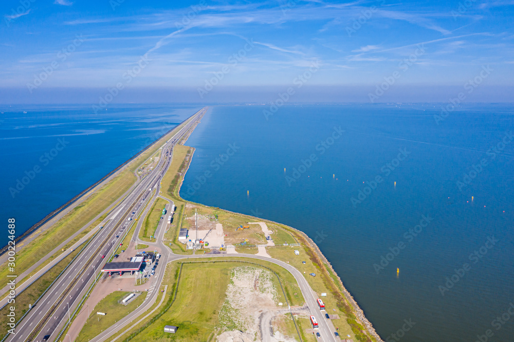 Afsluitdijk, a major dam and causeway in the Netherlands, runs from Den ...
