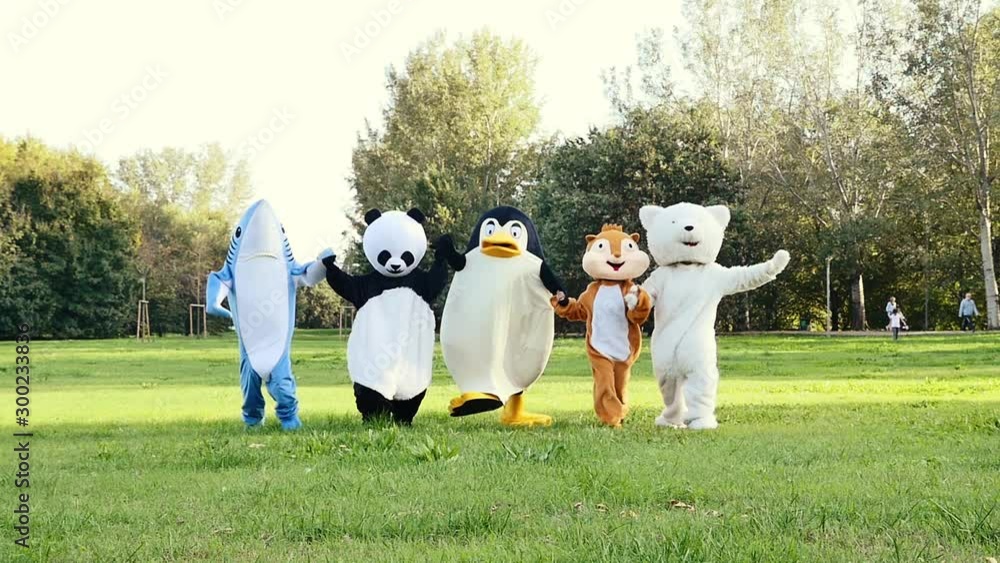 Group of mascots doing party. Concept about carnival, animals rights ...