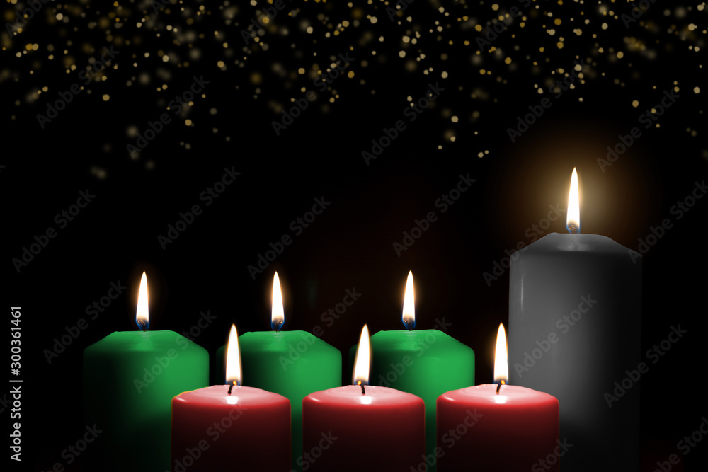 Kwanzaa for African-American cultural holiday celebration with candle ...