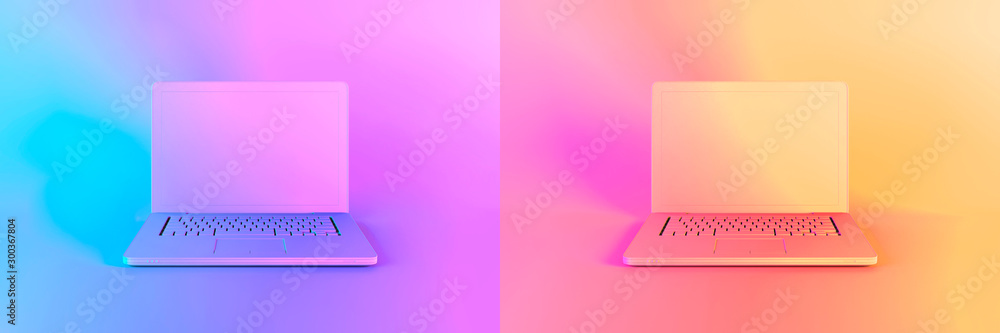 Laptop or notebook computer illuminated by bright gradient holographic ...