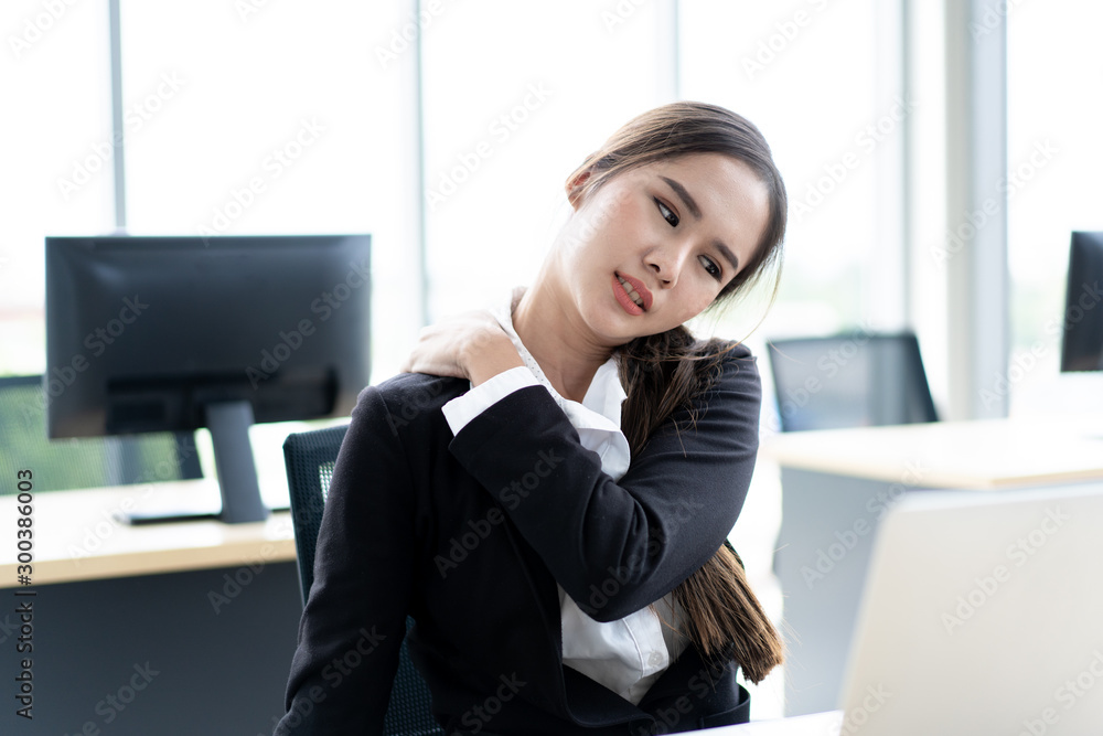 Beautiful Asian office woman having an office syndrome problem. Health ...