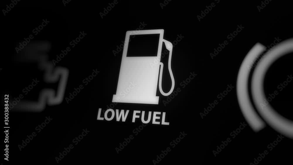 Low Fuel Level Warning Light on Car Dashboard. vídeo de Stock | Adobe Stock