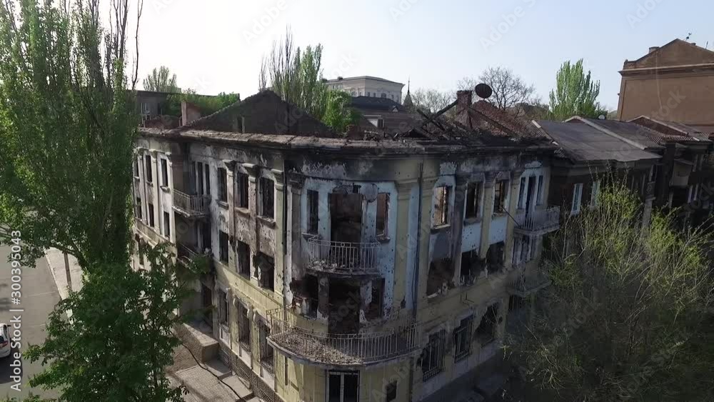 Aerial view.Ruins of buildings after war in Ukraine.Mariupol police ...