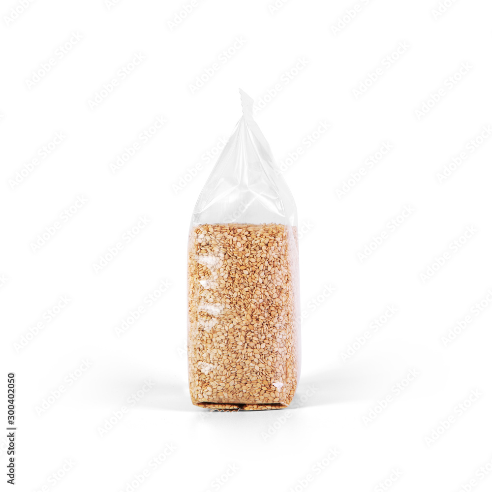 Sesame seeds in transparent plastic bag isolated on white background ...