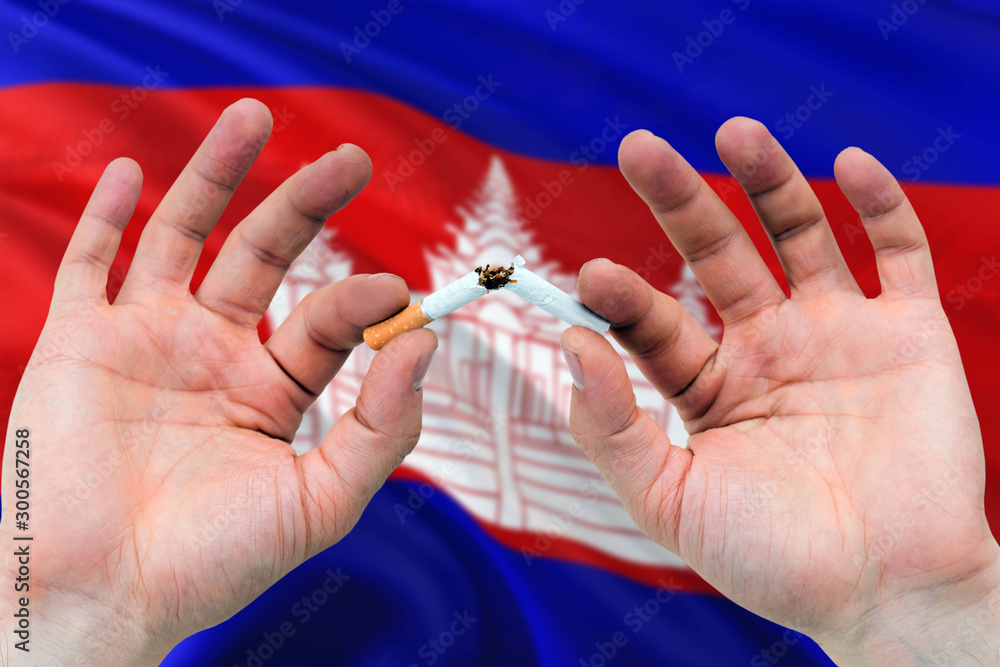 Cambodia quit smoking cigarettes concept. Adult man hands breaking ...