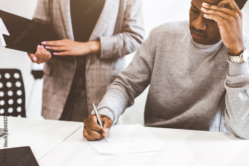 African american man signing contract, black man hand putting signature ...