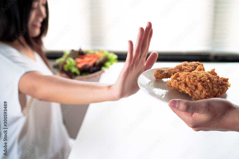 Dieting health concept, young woman rejecting Junk food and choosing ...