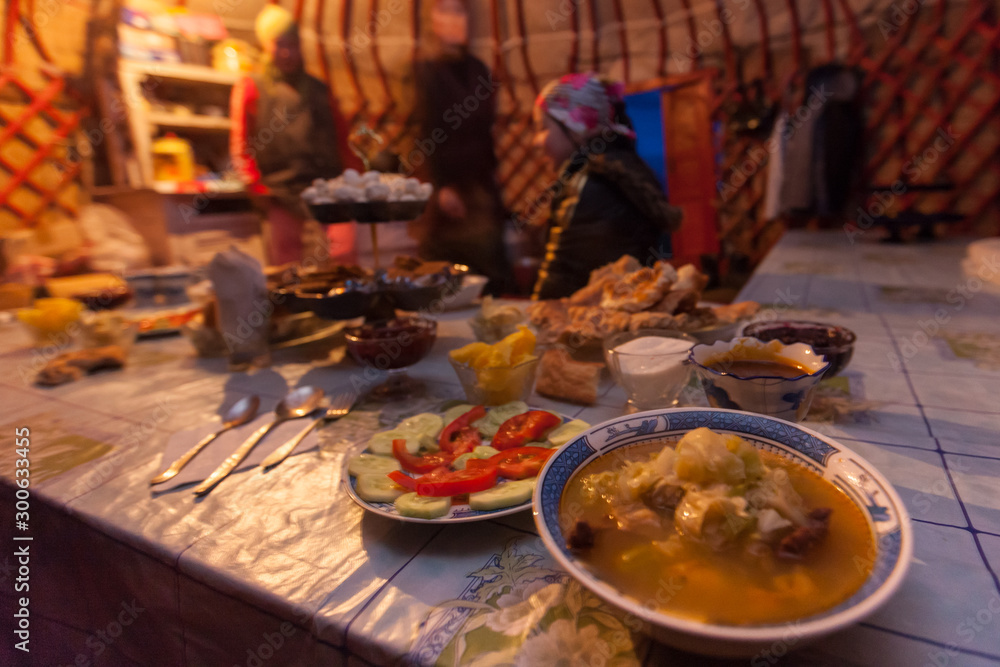 Kyrgyzstan, welcoming dinner in a yurt, Song-Kol lake Stock Photo ...