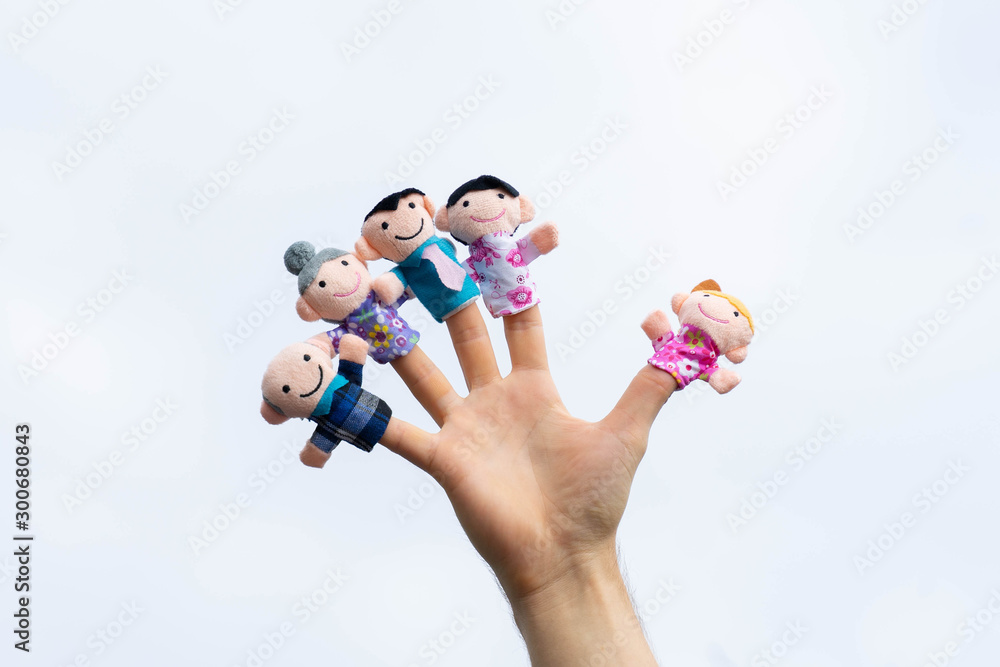 family finger puppet theater. child hand with finger puppets: son ...