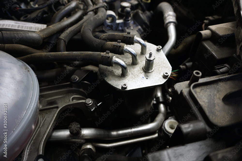 Fuel filter diesel engine. Fuel pipes connected to the fuel filter ...