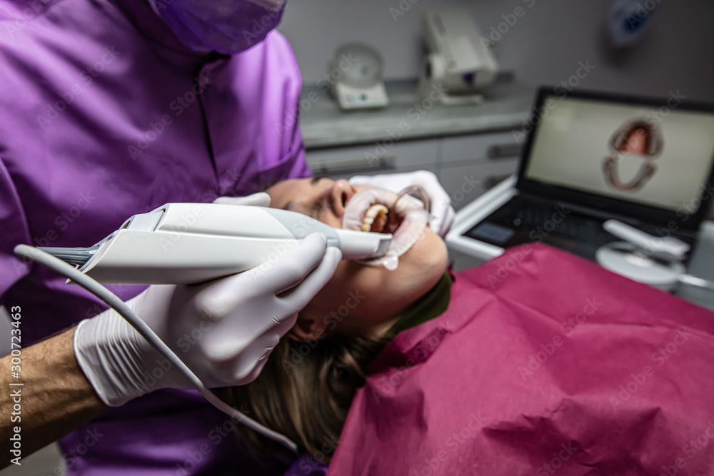 Dental 3d scanner 3Shape in the dentist's office. Stock Photo | Adobe Stock