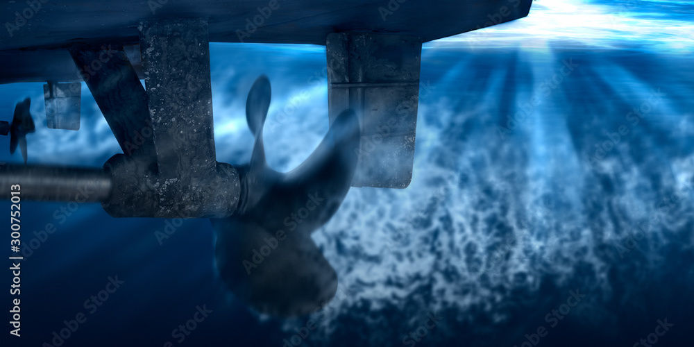 Propeller and rudder of big ship underway from underwater. Close up ...