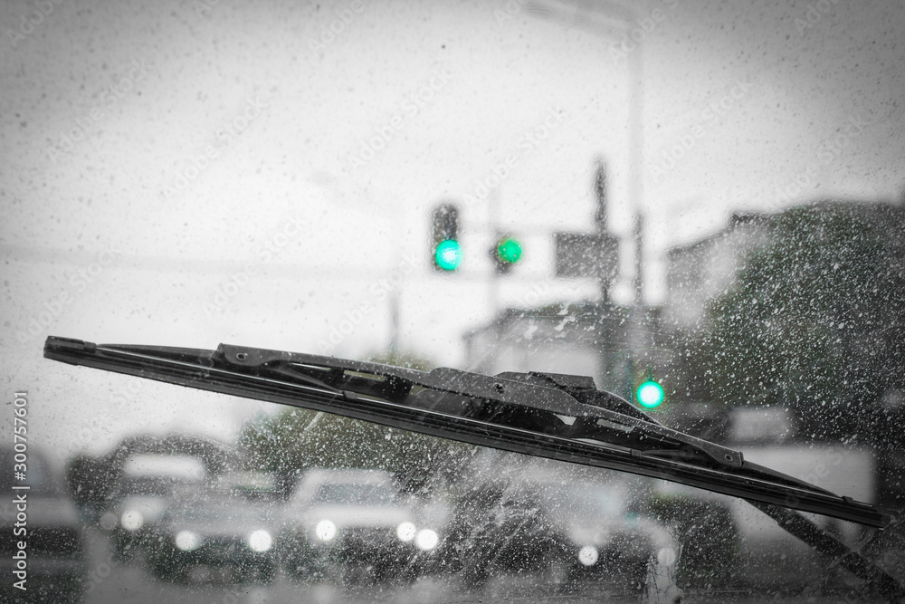 car windshield wipers in rainy season, black and white photo with ...