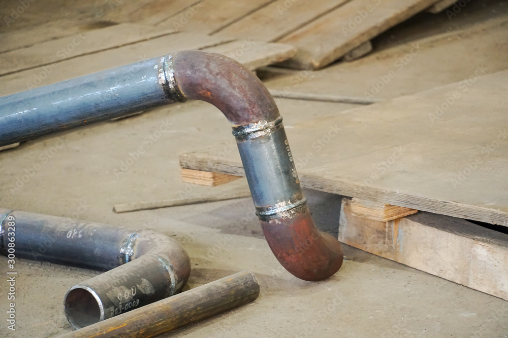 Welded butt joints of the pipeline and branch Du50, welded by manual ...