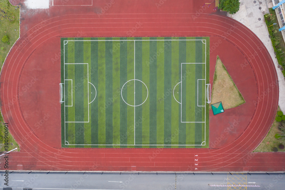 Aerial photography school small outdoor stadium with football field top ...