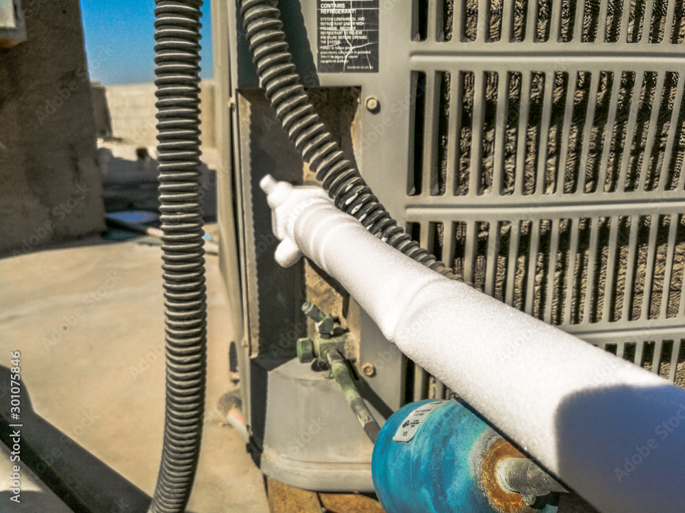 ice formation the AC compressor pipe is connected into a heavy ac unit ...