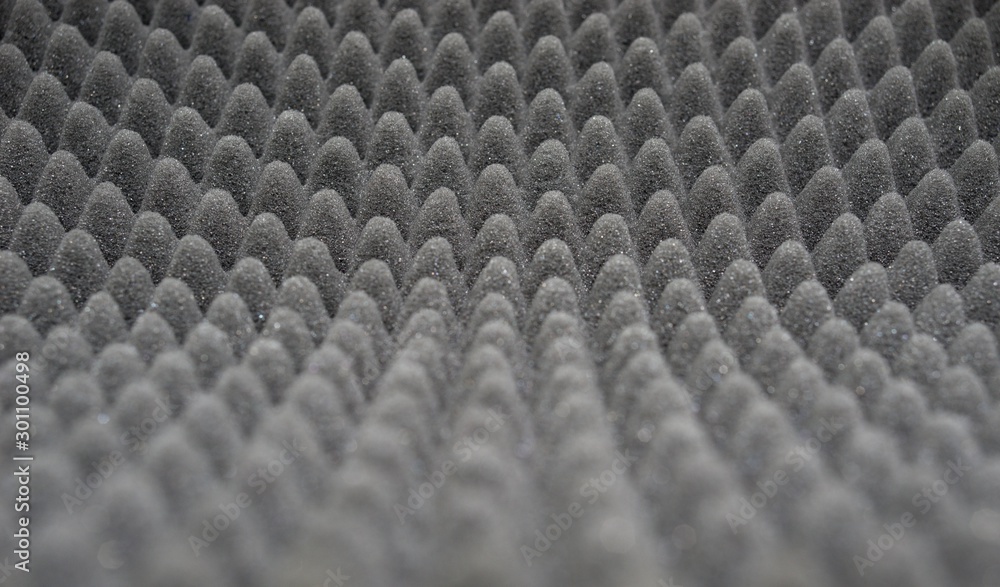 Dark artificial foam, acoustic foam insulation texture on background ...