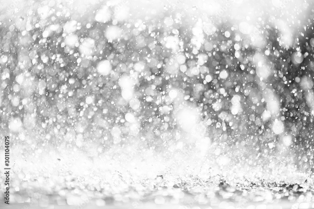 blue color tone of close up rain water drop falling to the floor in ...