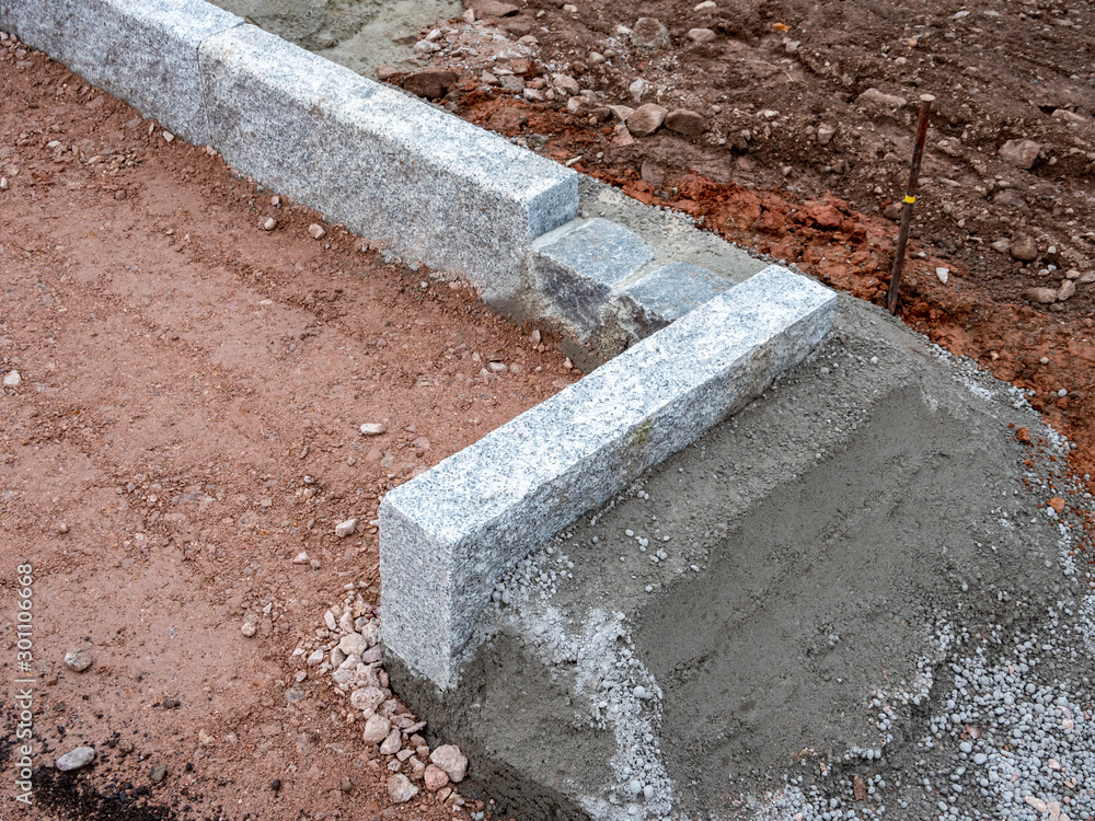 Bordsteine setzen im Straßenbau Stock Photo | Adobe Stock