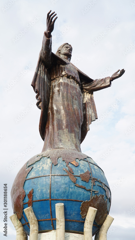 Cristo Rei Statue of Jesus at the beach on a hill at Cape Fatucama in ...