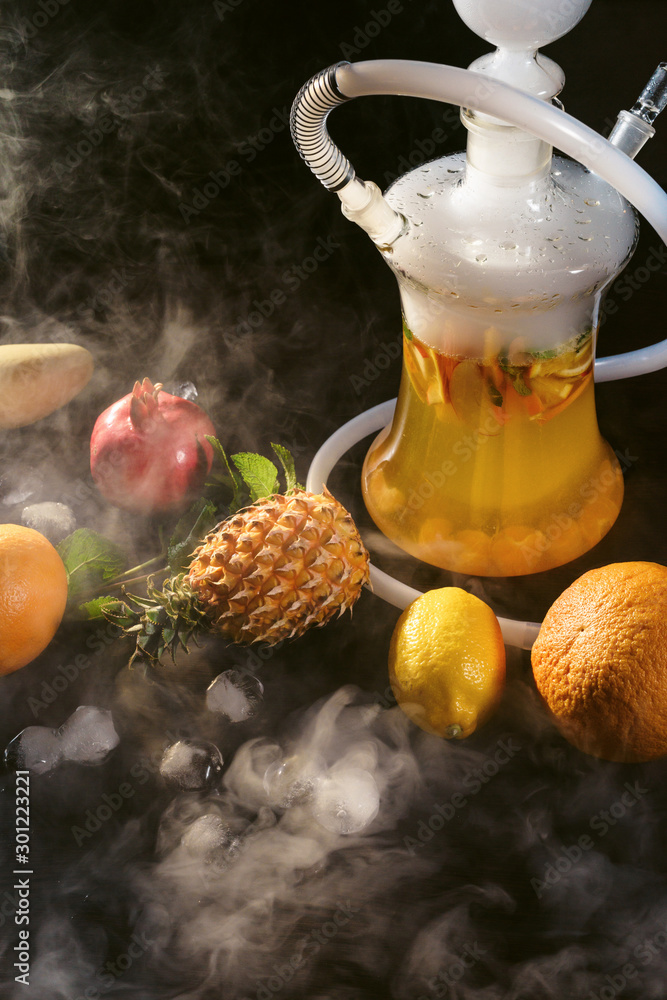 Beautiful traditional glass shisha hookah with grapefruit bowl and ...