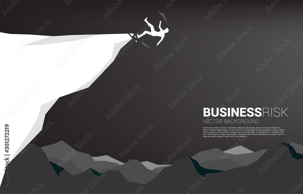 silhouette of businessman slip and falling down from the cliff. Concept ...